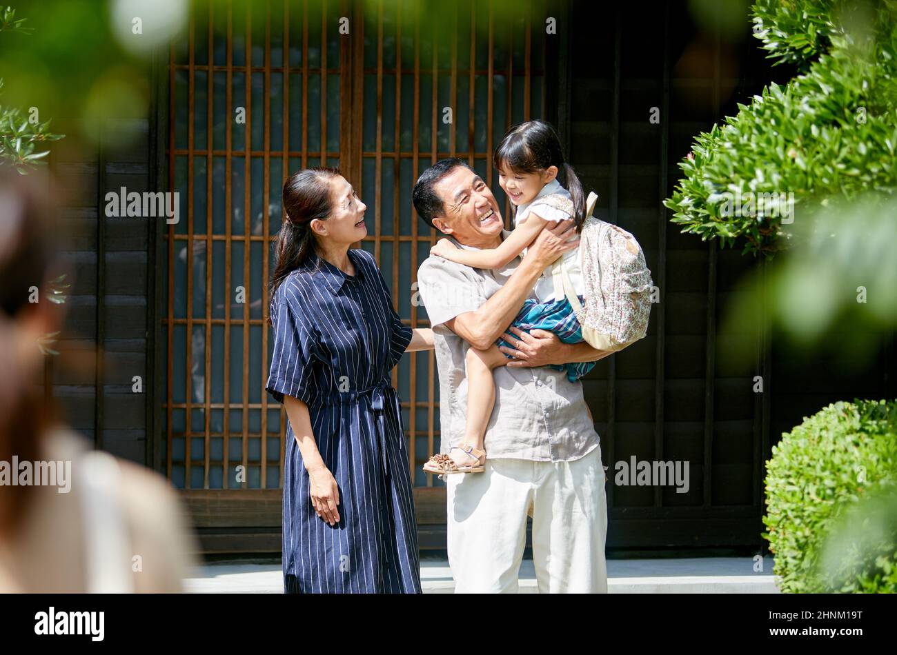 Smiling Three-Generations Japanese Family Stock Photo - Alamy