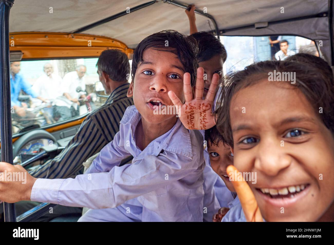 India Rajasthan Bundi. Smiling kids on a car Stock Photo - Alamy