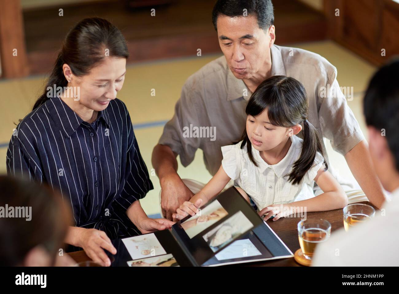 Smiling Three-Generations Japanese Family Stock Photo - Alamy