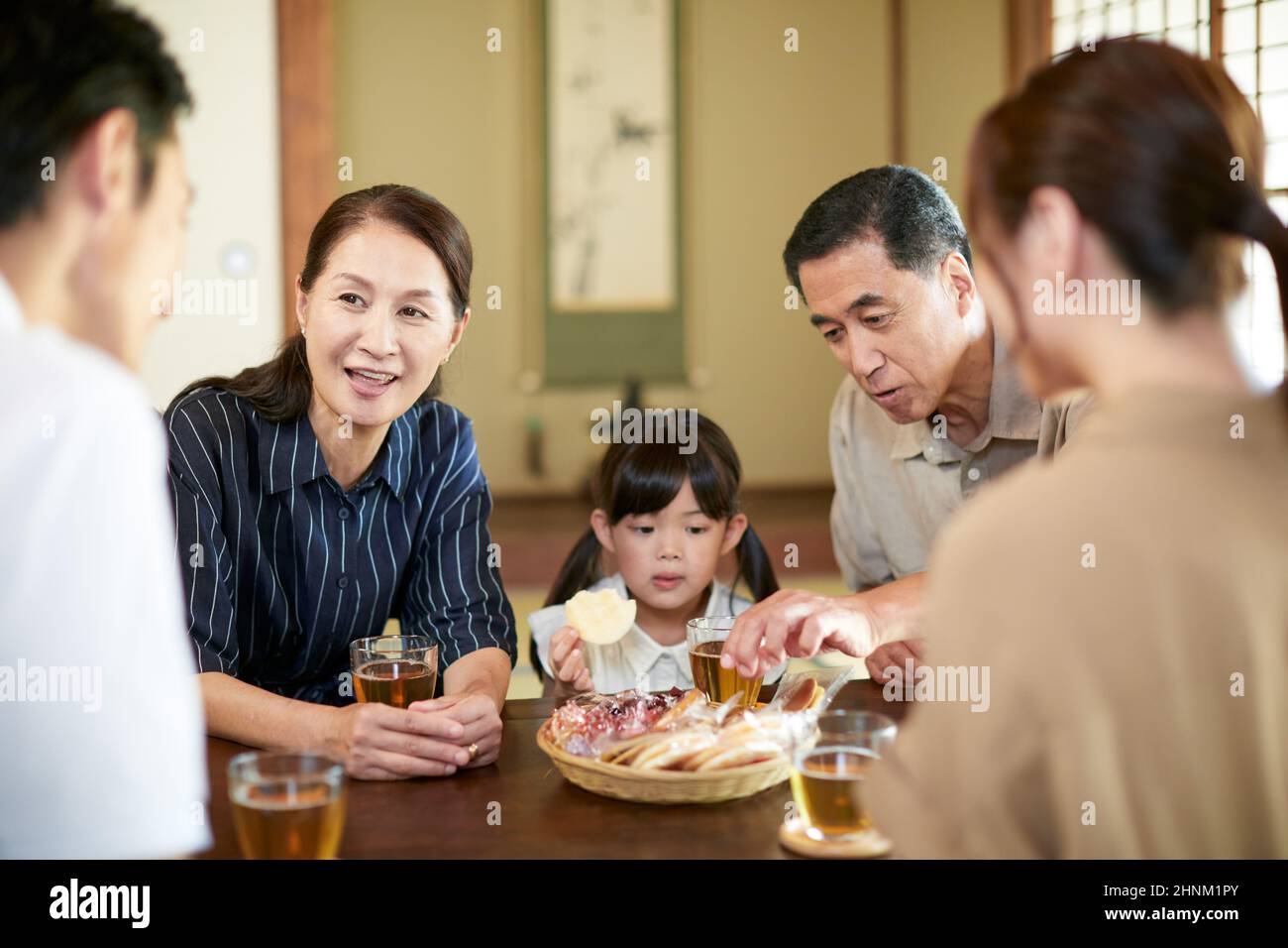 Smiling Three-Generations Japanese Family Stock Photo - Alamy