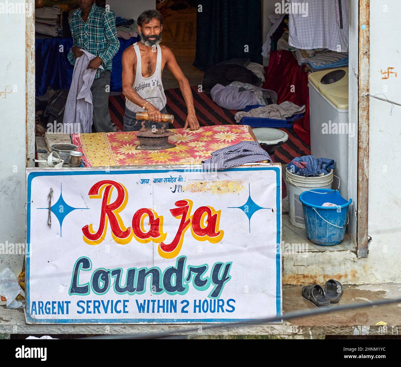 India Rajasthan Bundi. Ironing clothes Stock Photo - Alamy