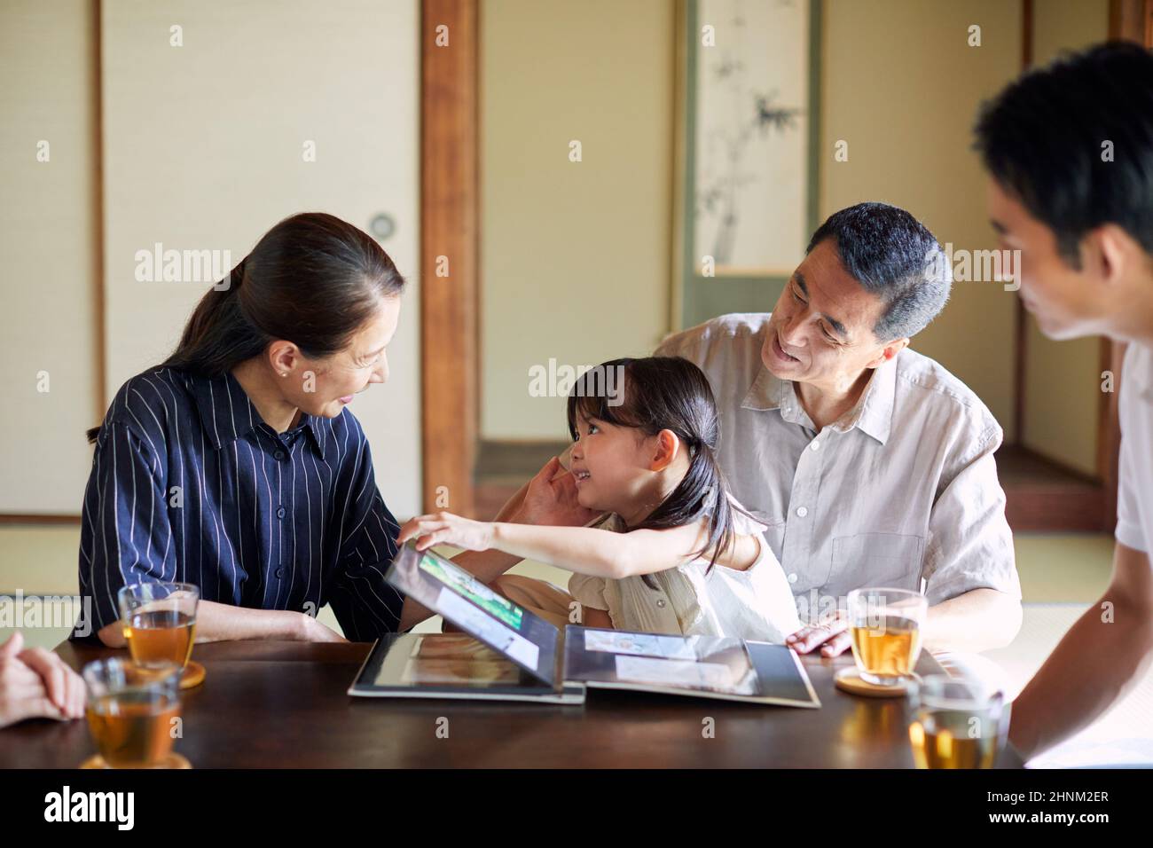 Smiling Three-Generations Japanese Family Stock Photo - Alamy