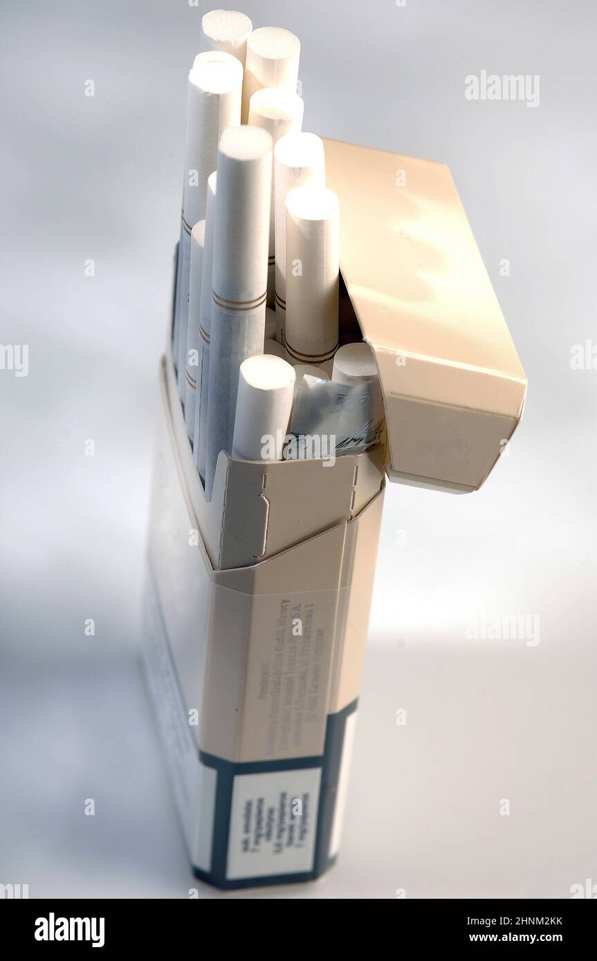 different types of cigarettes on a white background Stock Photo - Alamy