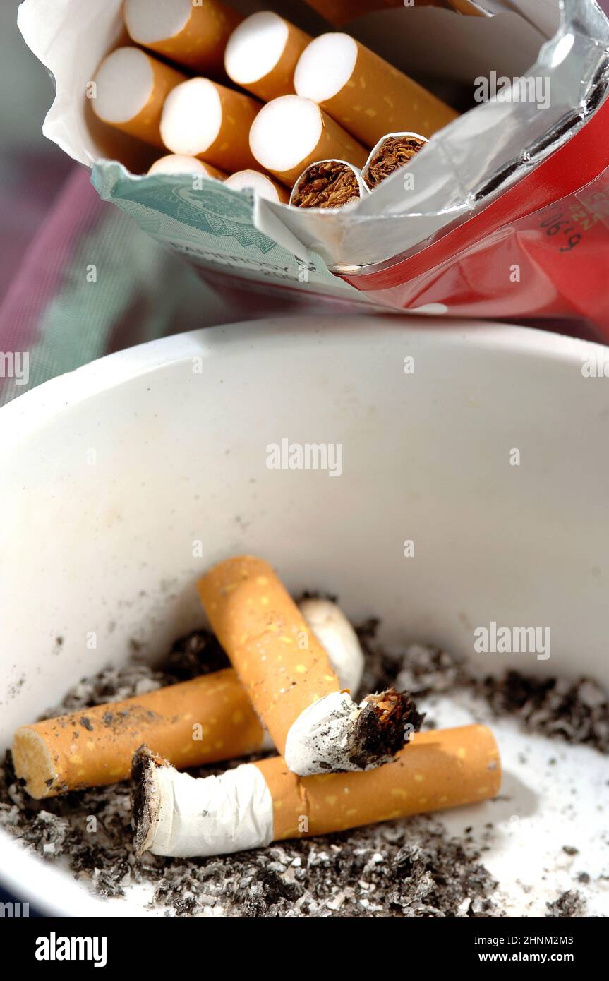 different types of cigarettes on a white background Stock Photo - Alamy