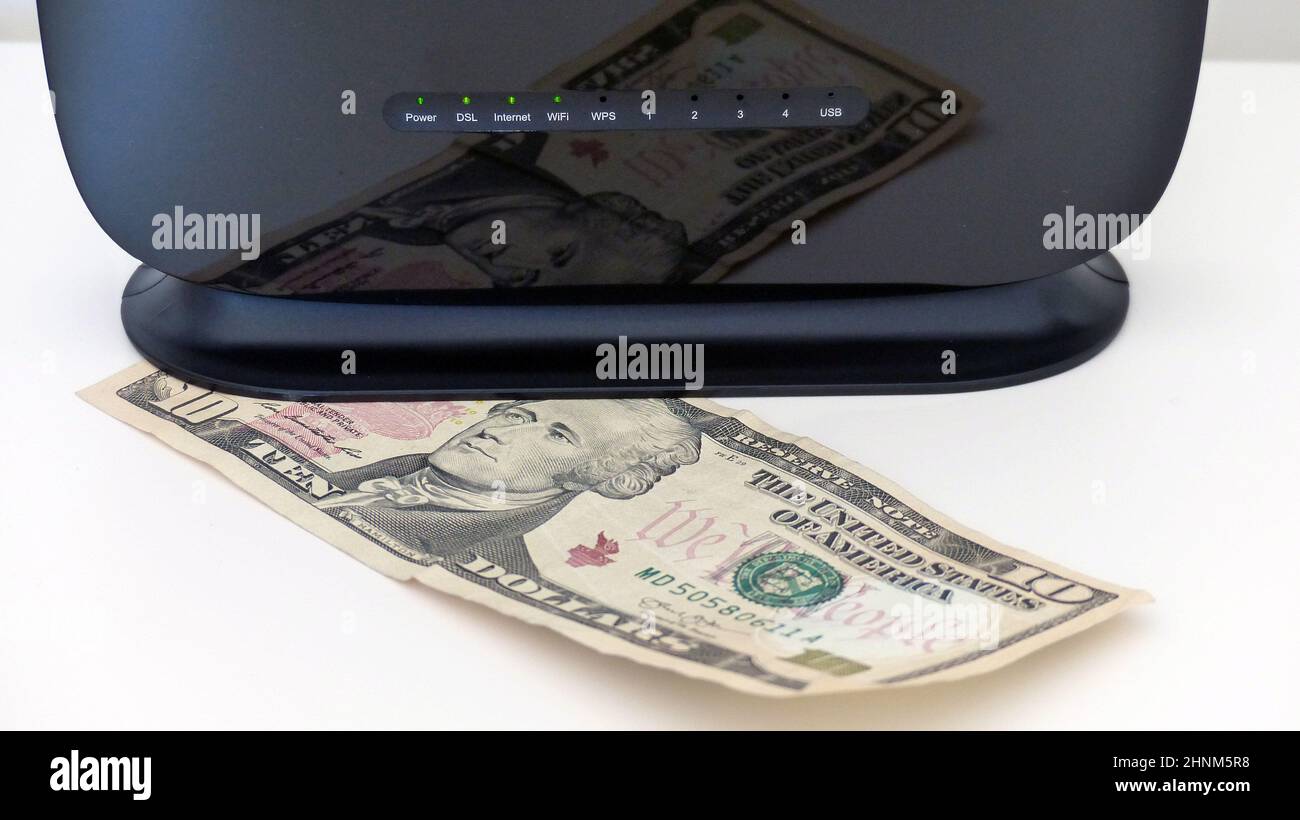internet usage fee increase, modem and 10 dollars next to it Stock ...