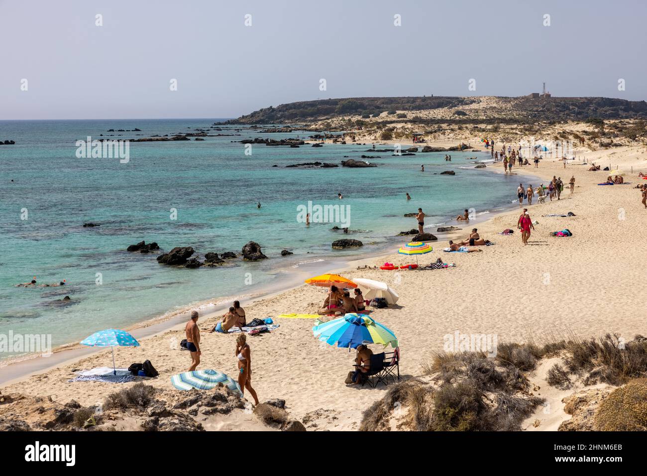 People relaxing on the famous pink coral beach of Elafonisi on Crete ...