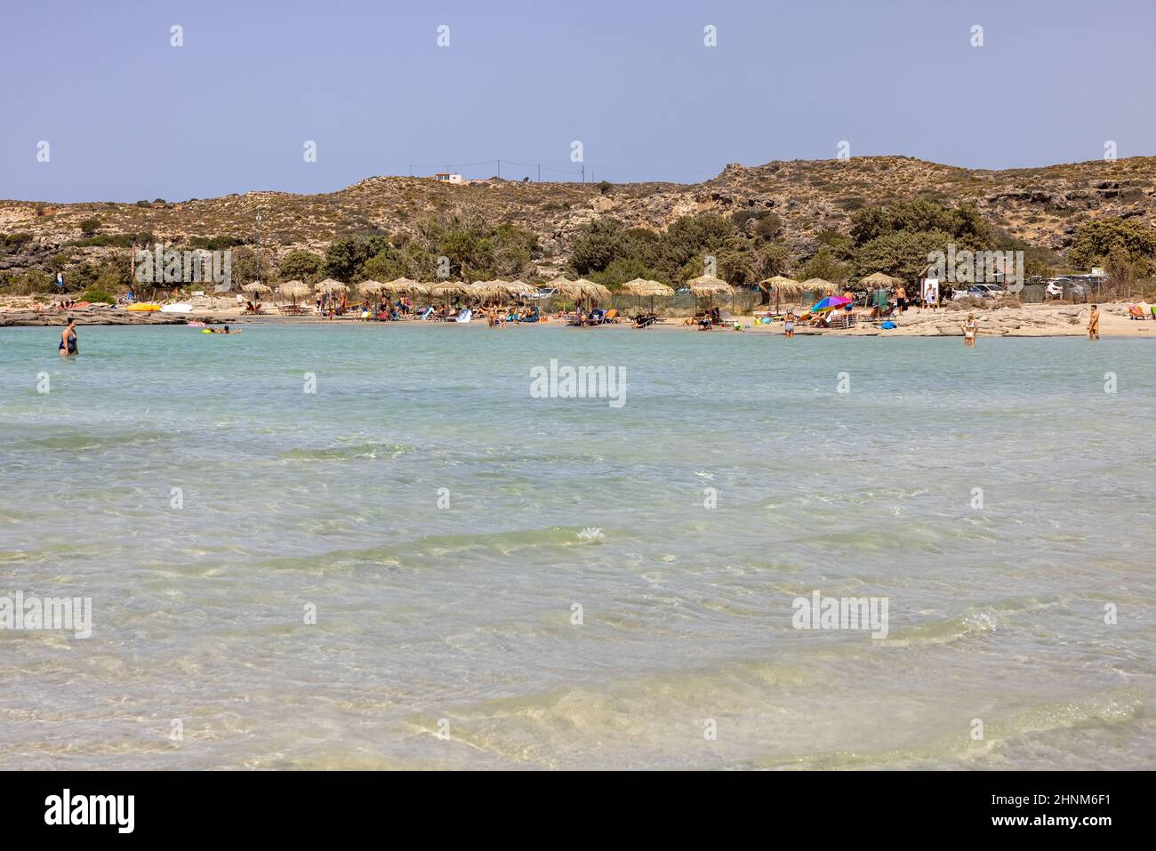 People relaxing on the famous pink coral beach of Elafonisi on Crete ...