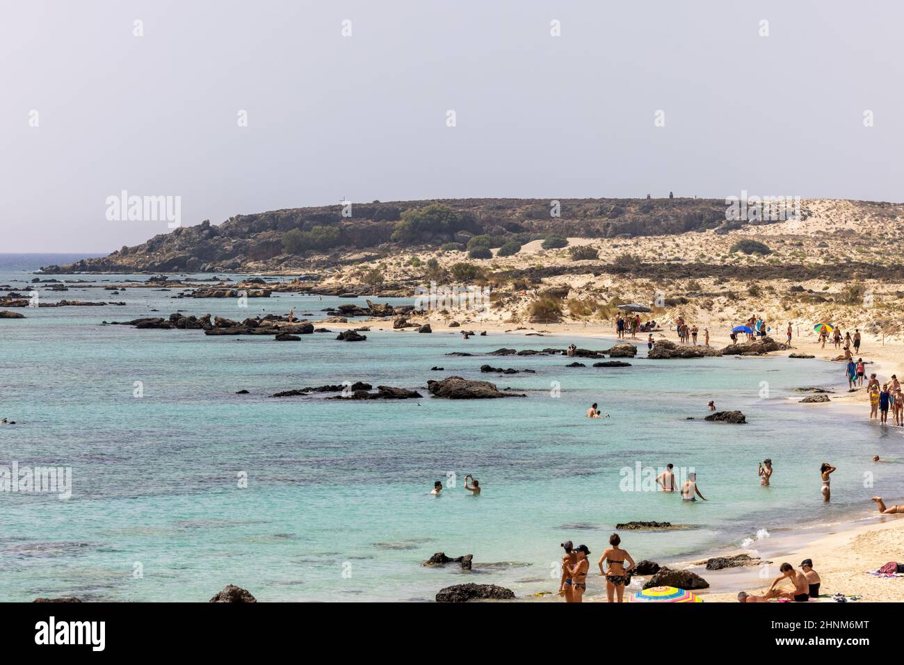 People relaxing on the famous pink coral beach of Elafonisi on Crete ...