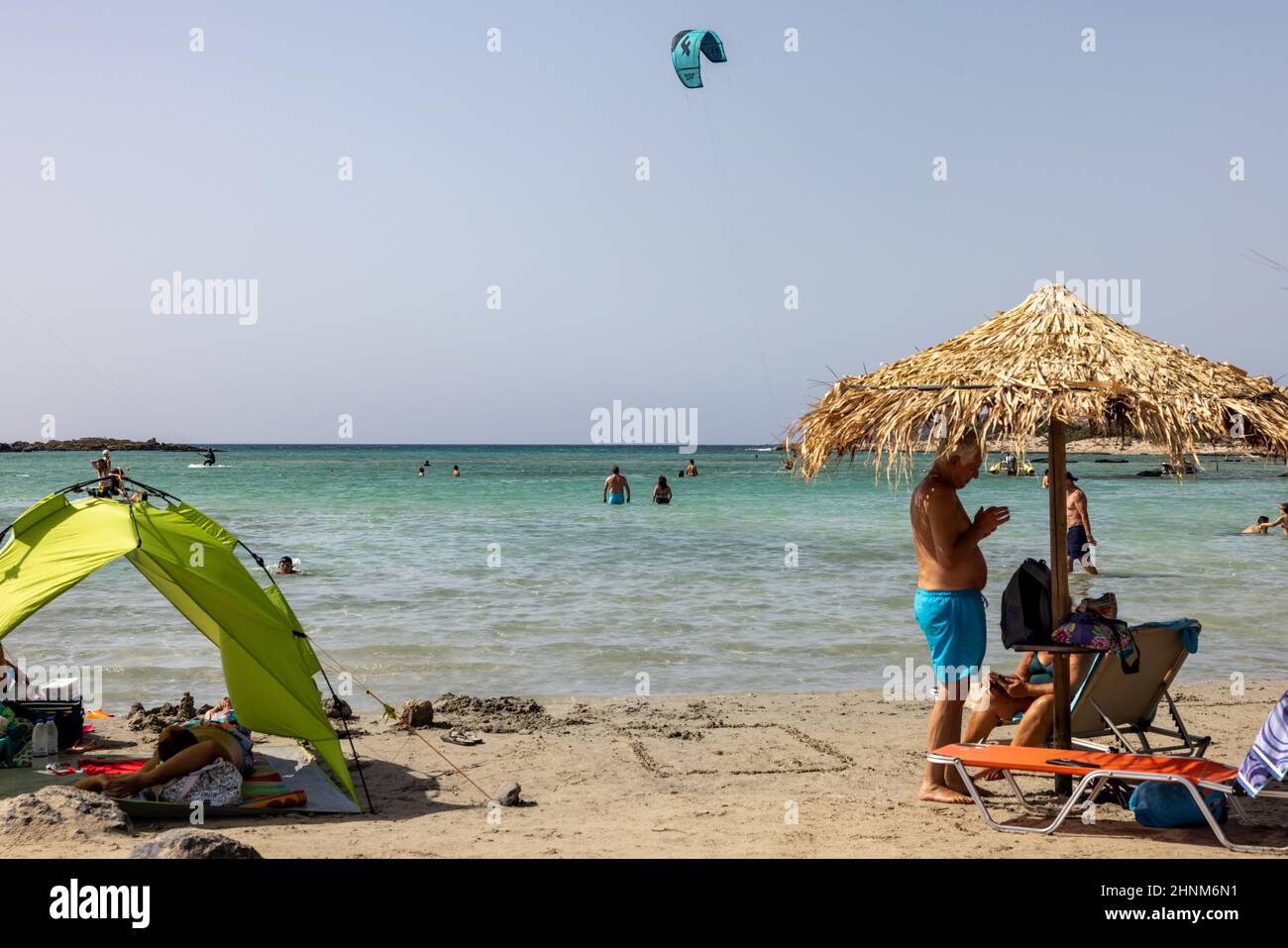 People relaxing on the famous pink coral beach of Elafonisi on Crete ...
