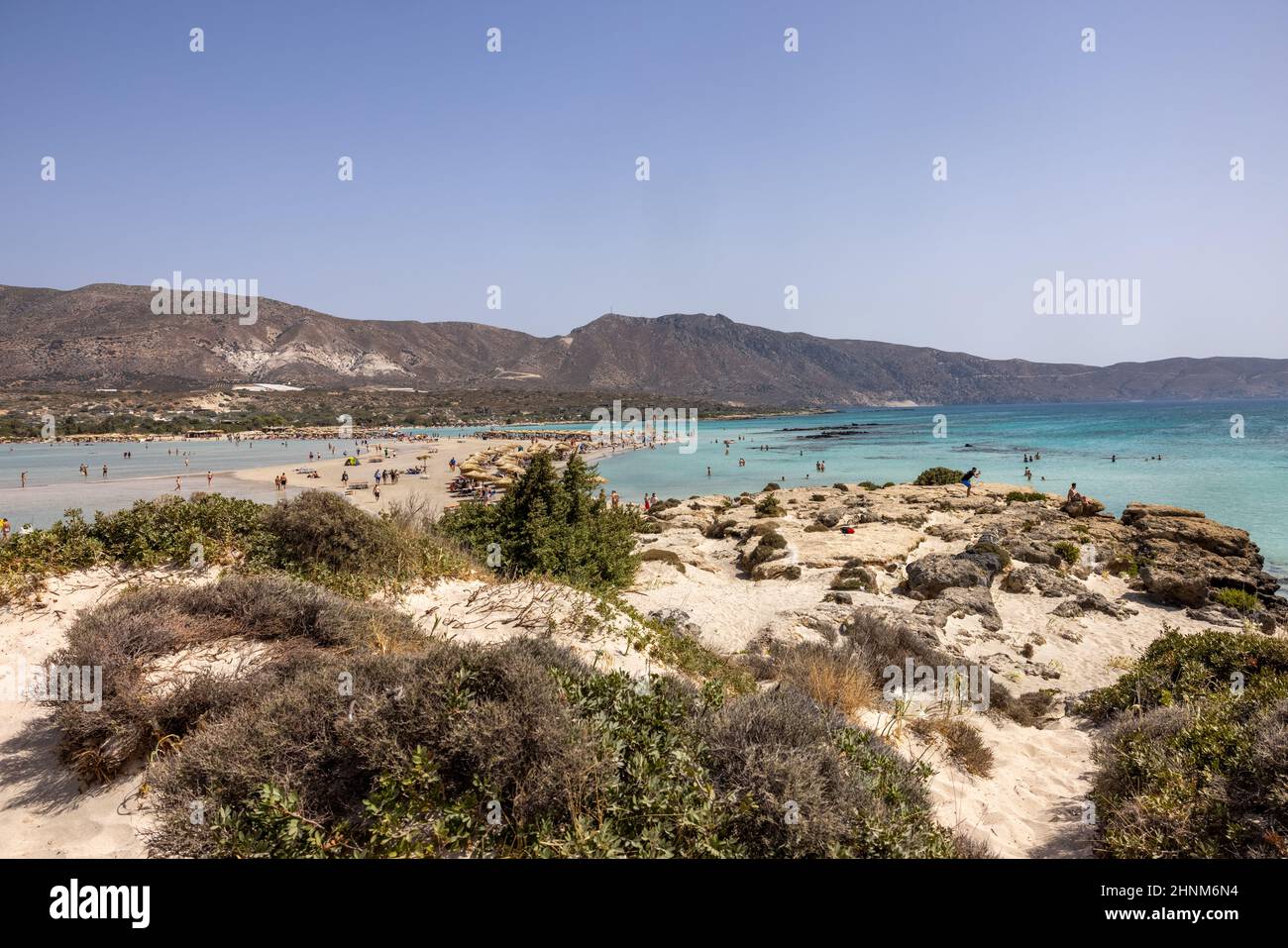 People relaxing on the famous pink coral beach of Elafonisi on Crete ...
