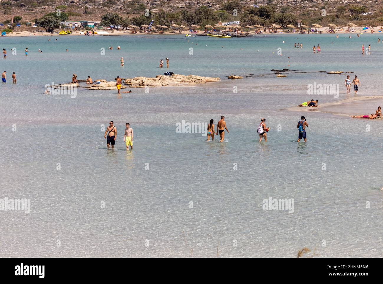 People relaxing on the famous pink coral beach of Elafonisi on Crete ...