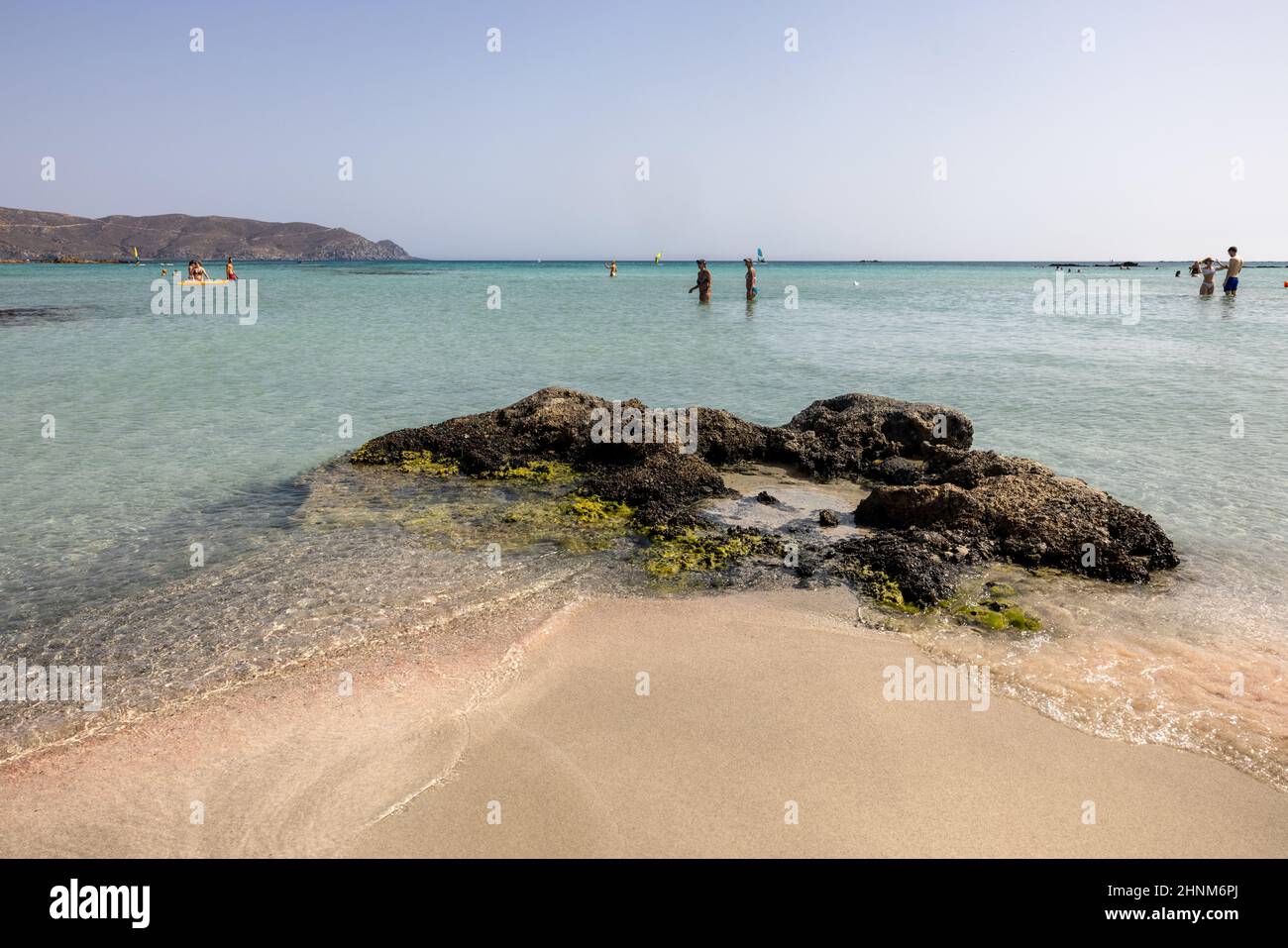 People relaxing on the famous pink coral beach of Elafonisi on Crete ...