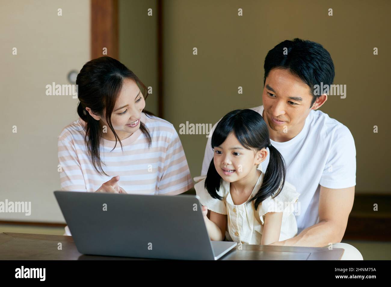 Japanese Family Making A Video Call Stock Photo - Alamy