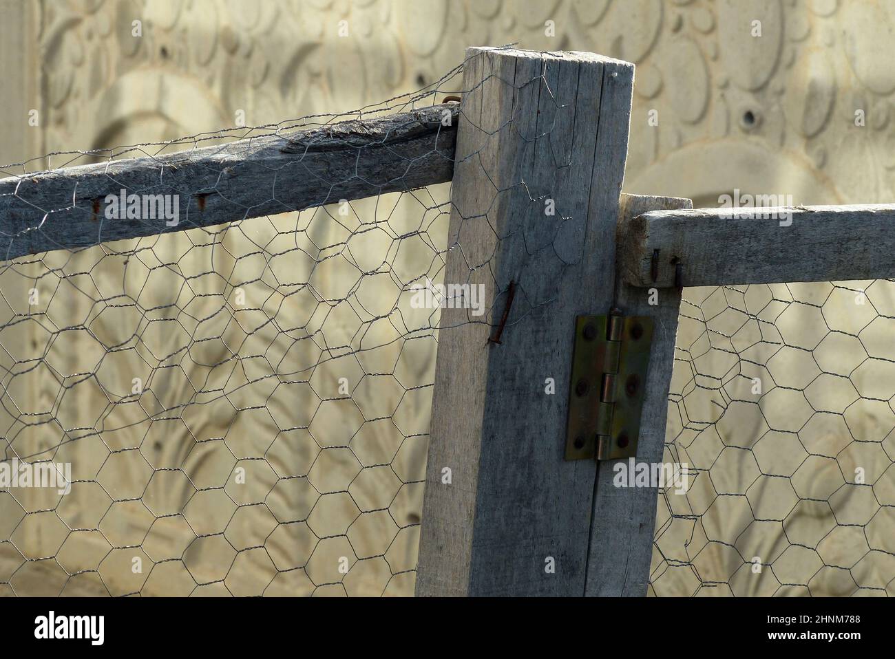 wooden garden fence, wooden wire mesh garden fence gate Stock Photo - Alamy
