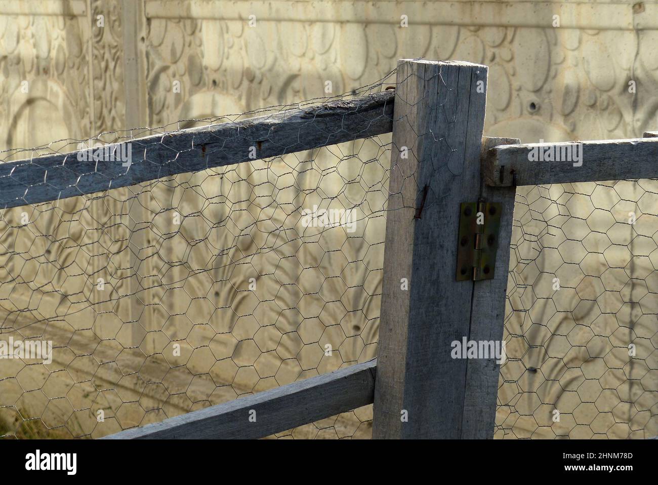 wooden garden fence, wooden wire mesh garden fence gate Stock Photo - Alamy