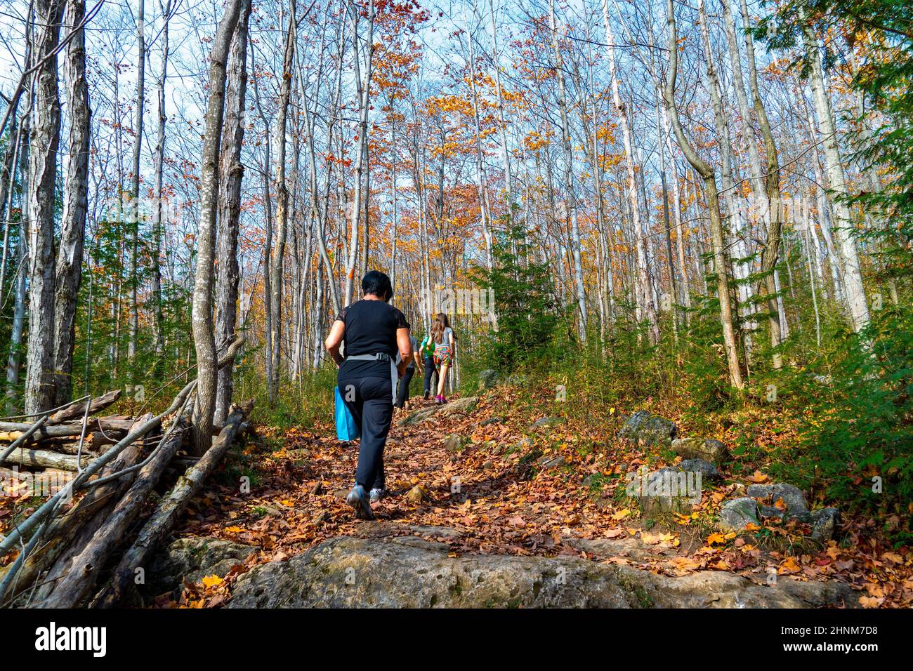 Tourists walk along mountain road hi-res stock photography and images ...