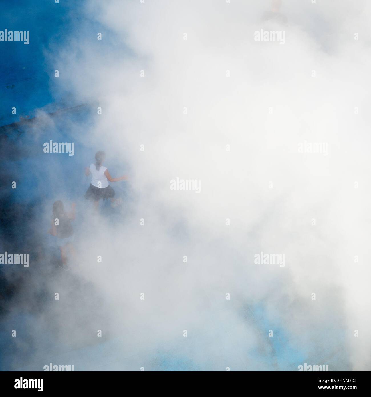 People in fog Stock Photo - Alamy