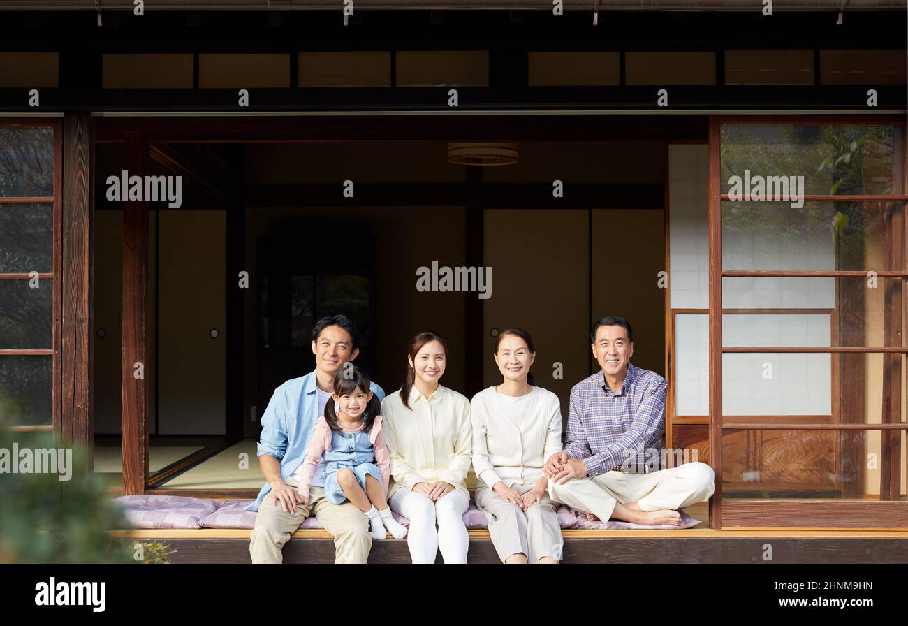 Three-Generations Japanese Family Sitting On The Porch Stock Photo - Alamy