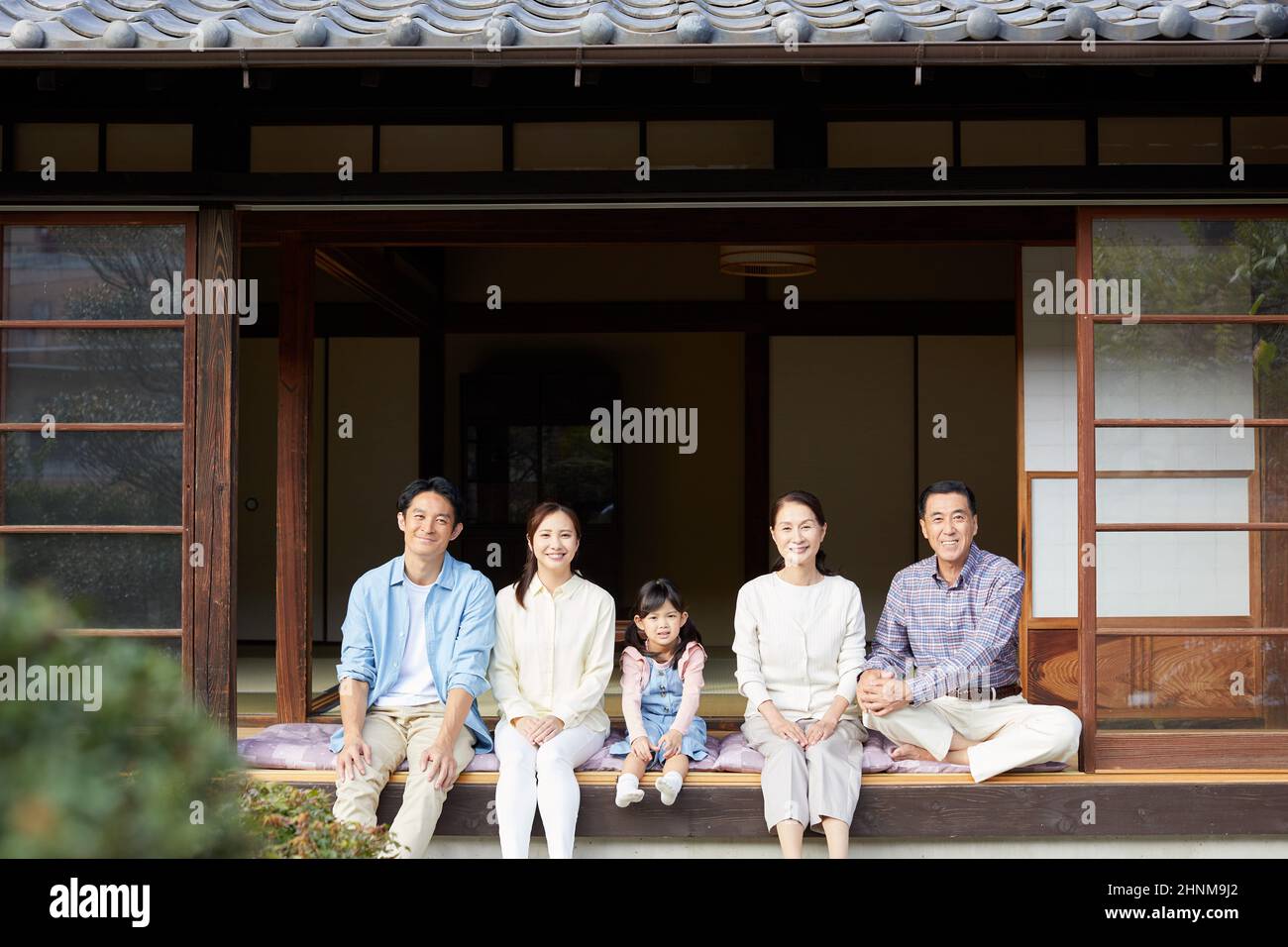 Three-Generations Japanese Family Sitting On The Porch Stock Photo - Alamy