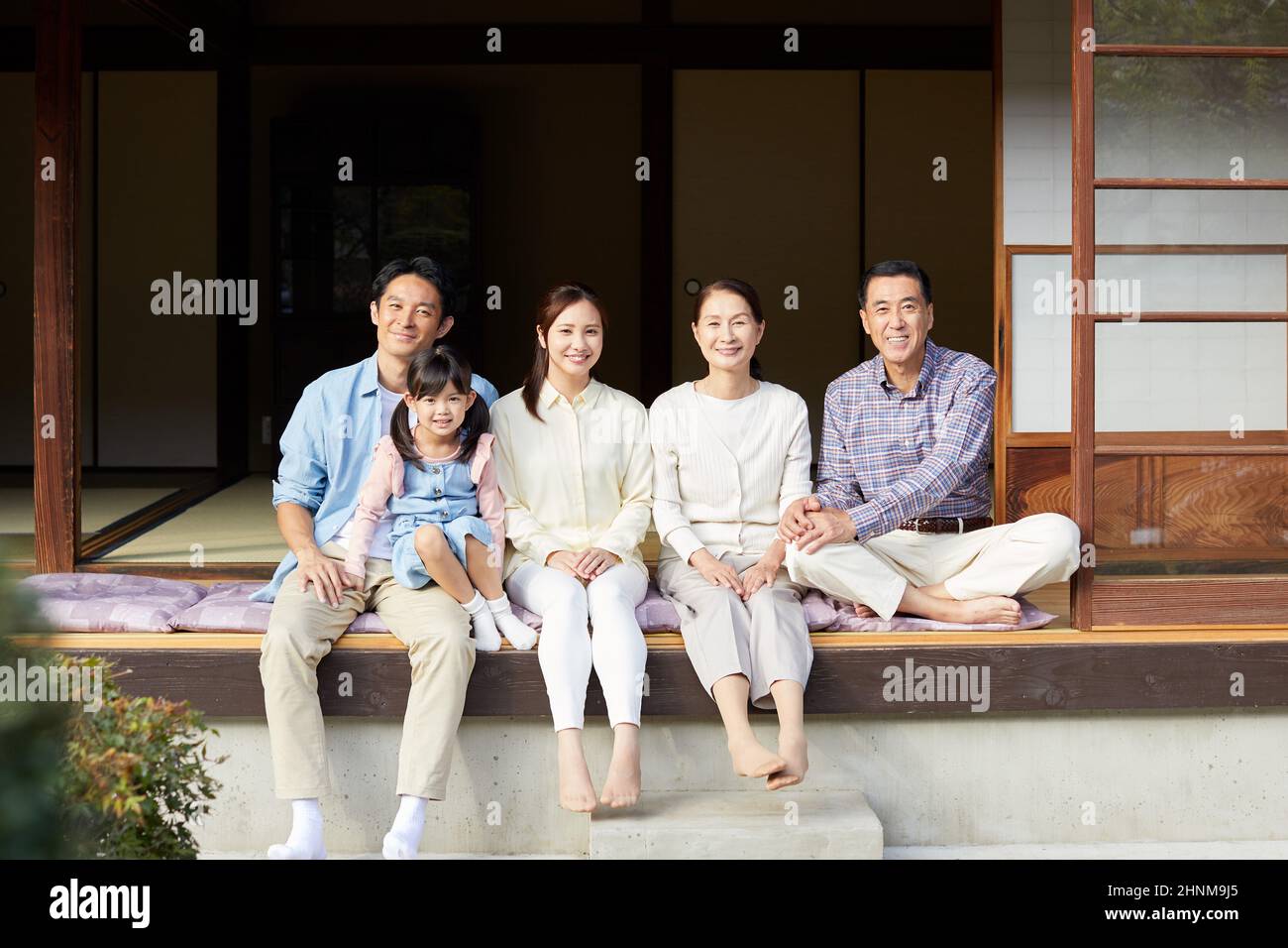 Three-Generations Japanese Family Sitting On The Porch Stock Photo - Alamy
