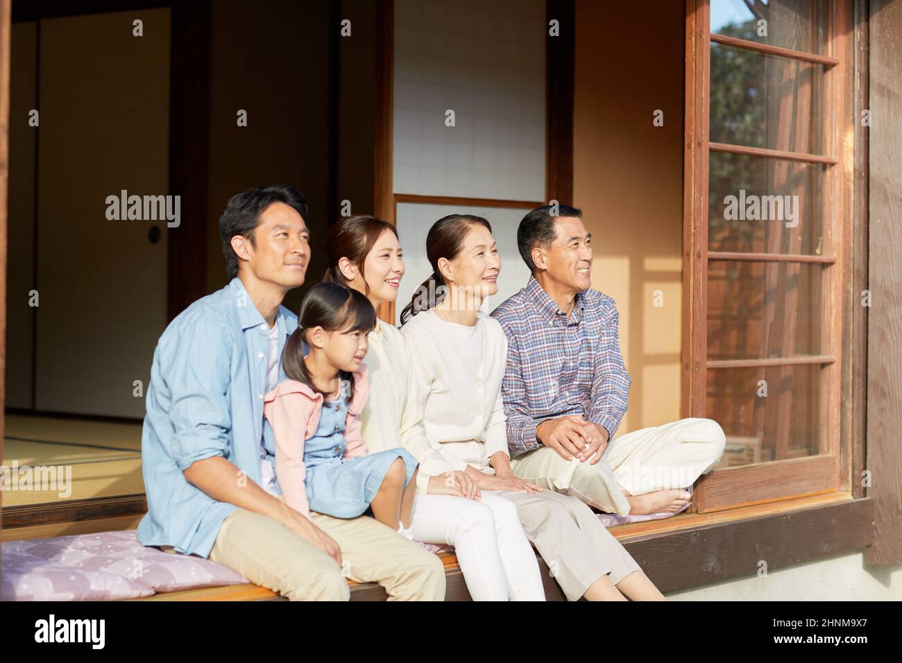 Three-Generations Japanese Family Sitting On The Porch Stock Photo - Alamy