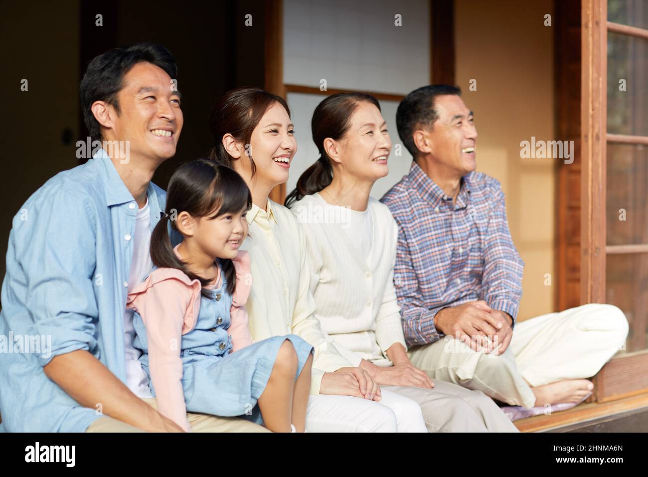 Three-Generations Japanese Family Sitting On The Porch Stock Photo - Alamy