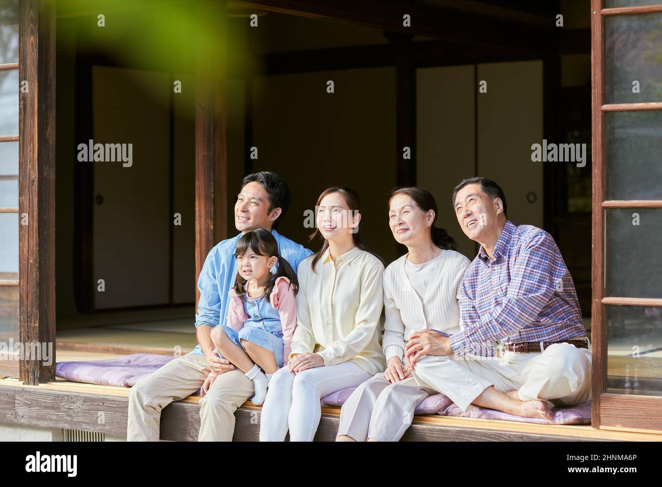 Three-Generations Japanese Family Sitting On The Porch Stock Photo - Alamy