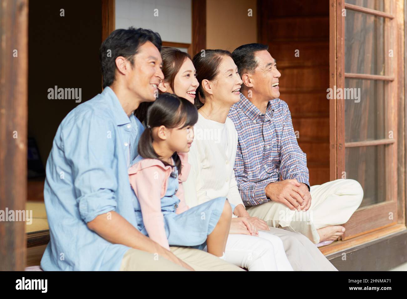 Three-Generations Japanese Family Sitting On The Porch Stock Photo - Alamy