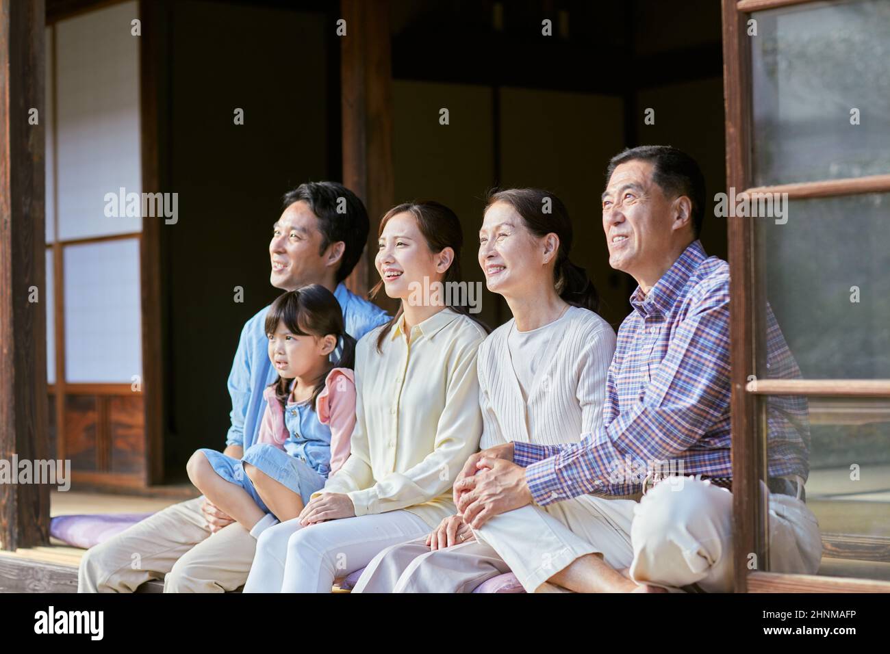 Three-Generations Japanese Family Sitting On The Porch Stock Photo - Alamy