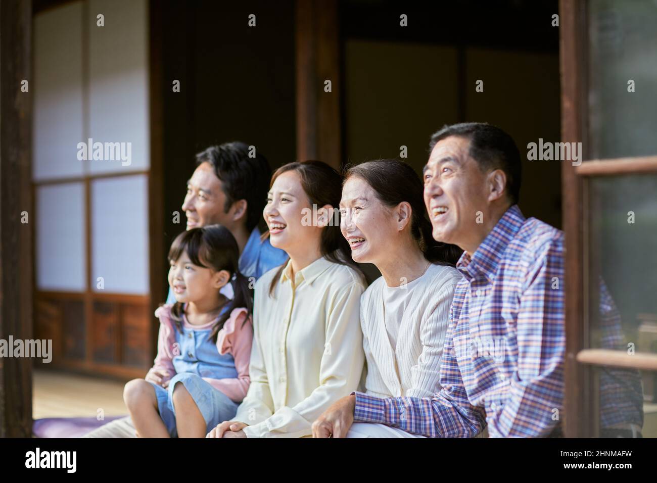 Three-Generations Japanese Family Sitting On The Porch Stock Photo - Alamy