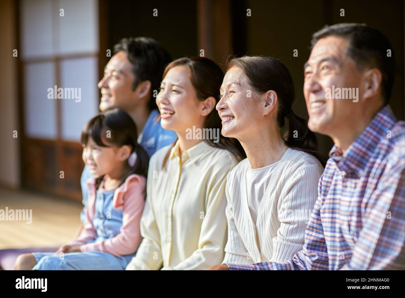 Three-Generations Japanese Family Sitting On The Porch Stock Photo - Alamy