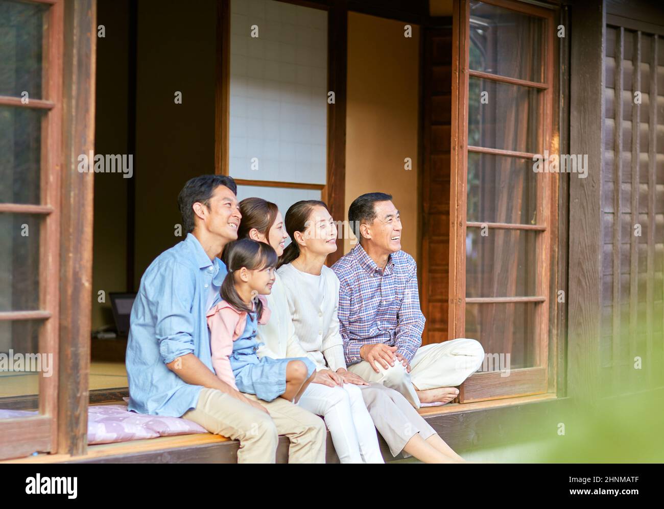 Three-Generations Japanese Family Sitting On The Porch Stock Photo - Alamy