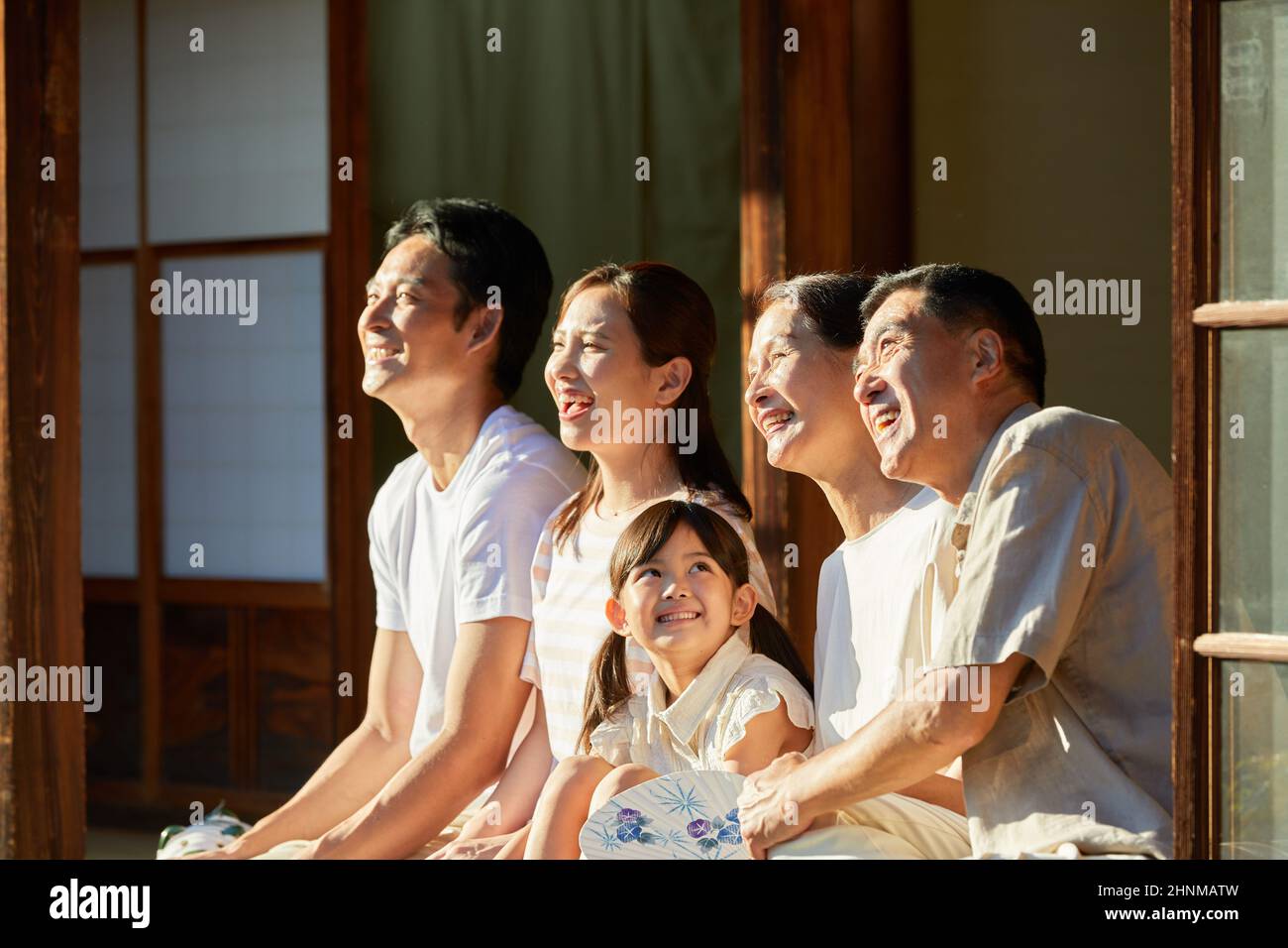 Three-Generations Japanese Family Sitting On The Porch Stock Photo - Alamy