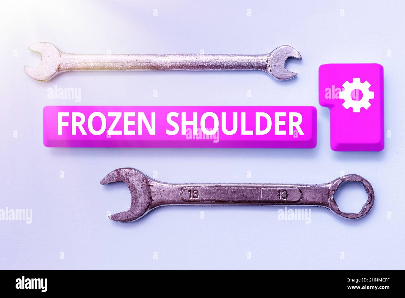 Hand writing sign Frozen Shoulder, Business overview characterized by ...