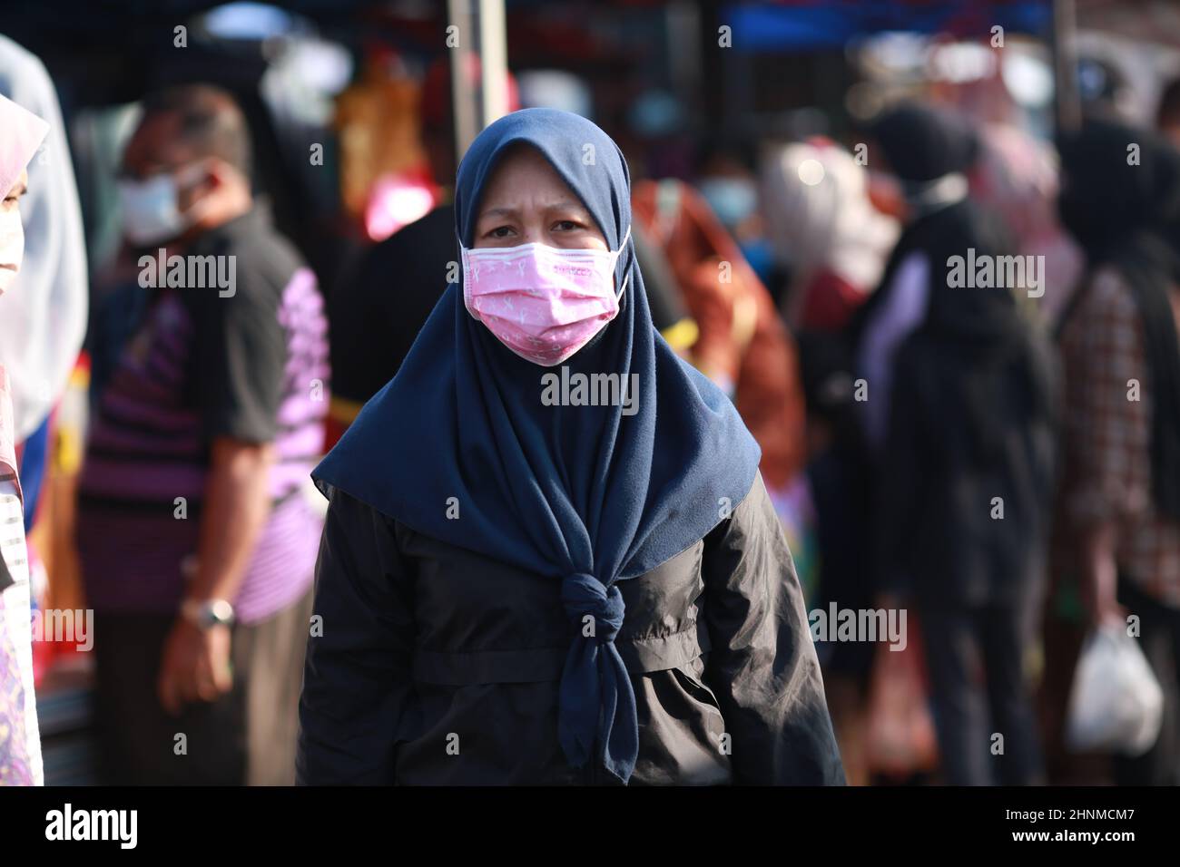 Photo of local people in a market to buy fresh food , some snacks to ...