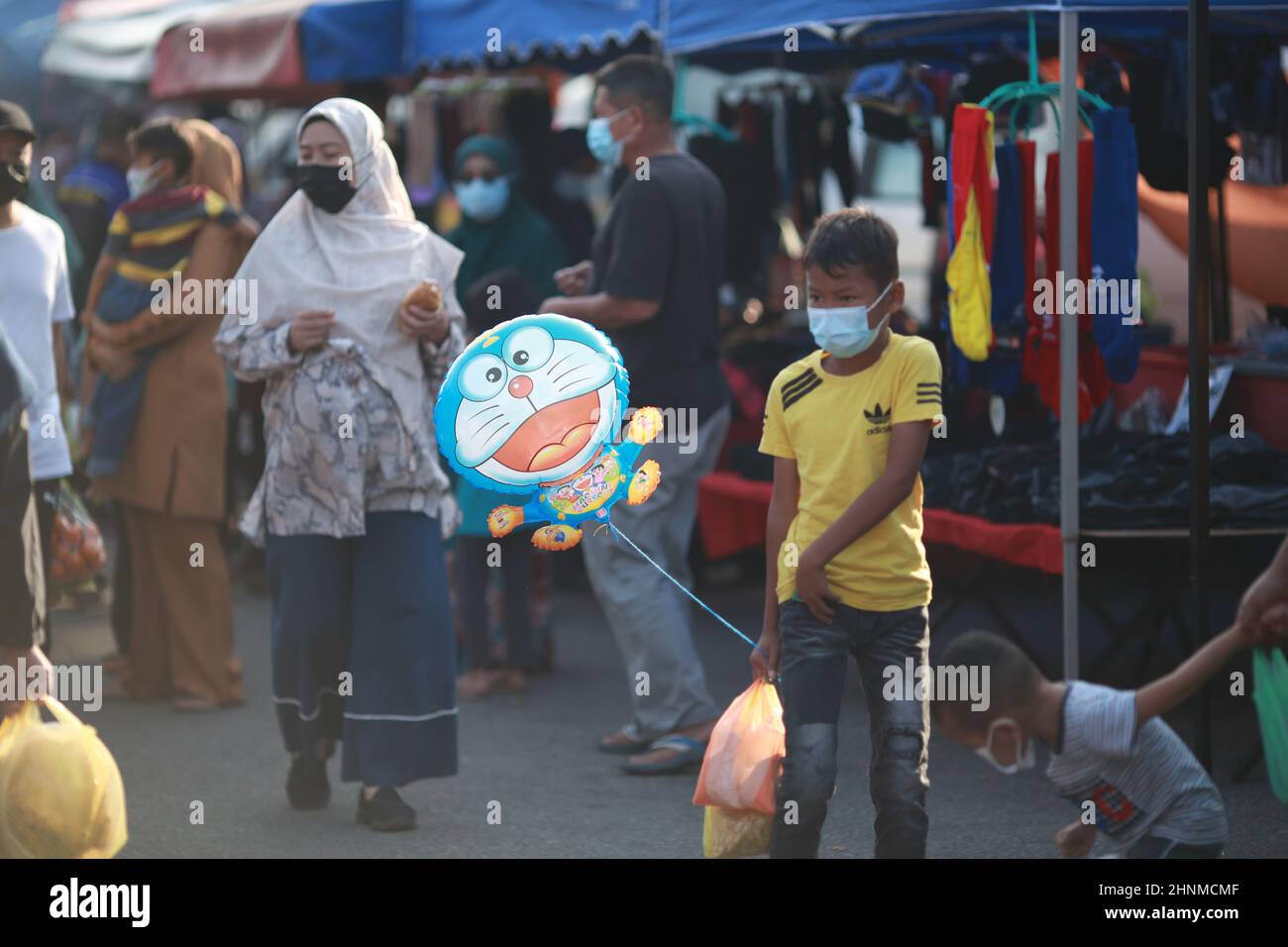 Photo of local people in a market to buy fresh food , some snacks to ...