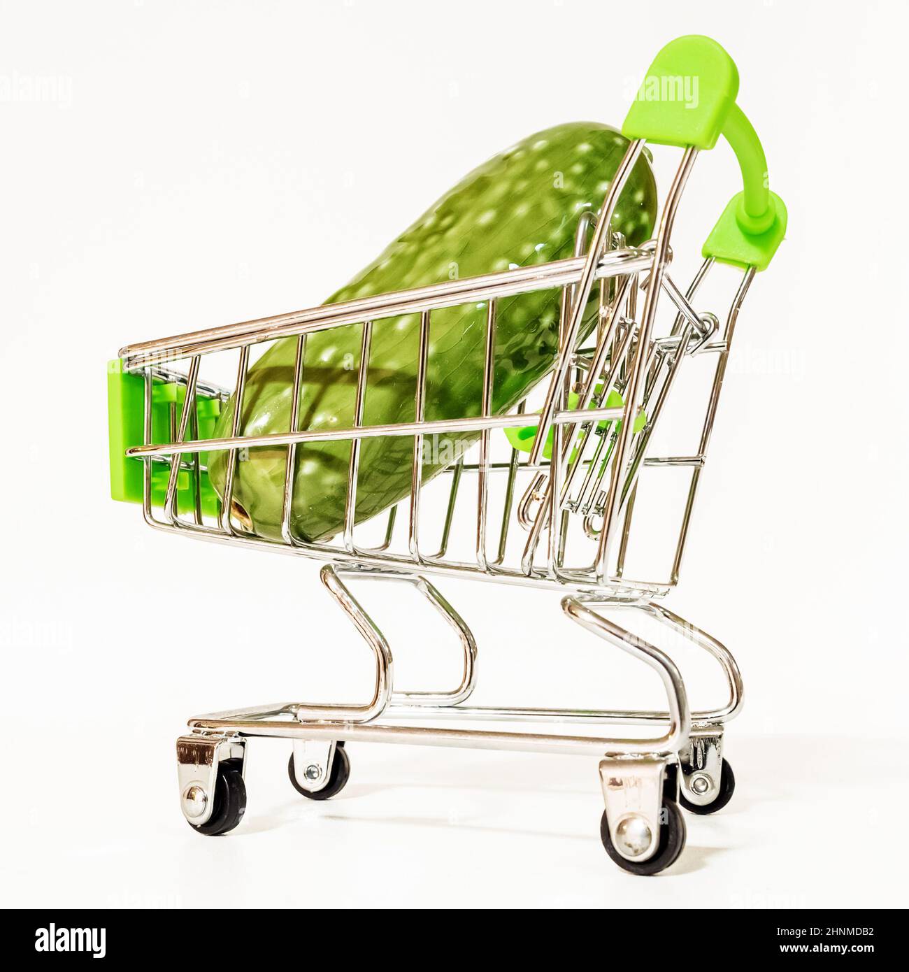 Tiny miniature shopping cart Cut Out Stock Images & Pictures - Alamy