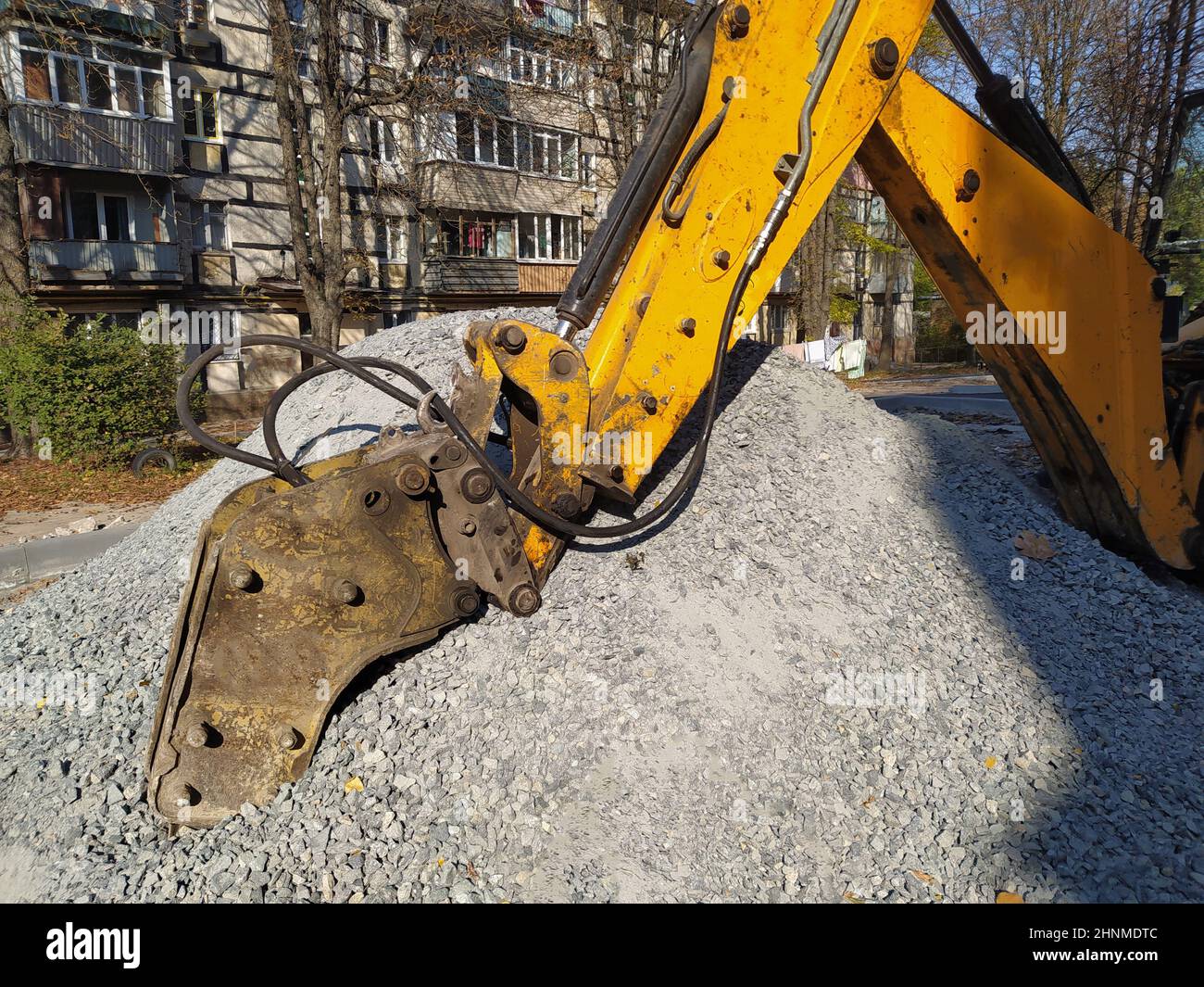 Excavator parked at the construction area Stock Photo - Alamy