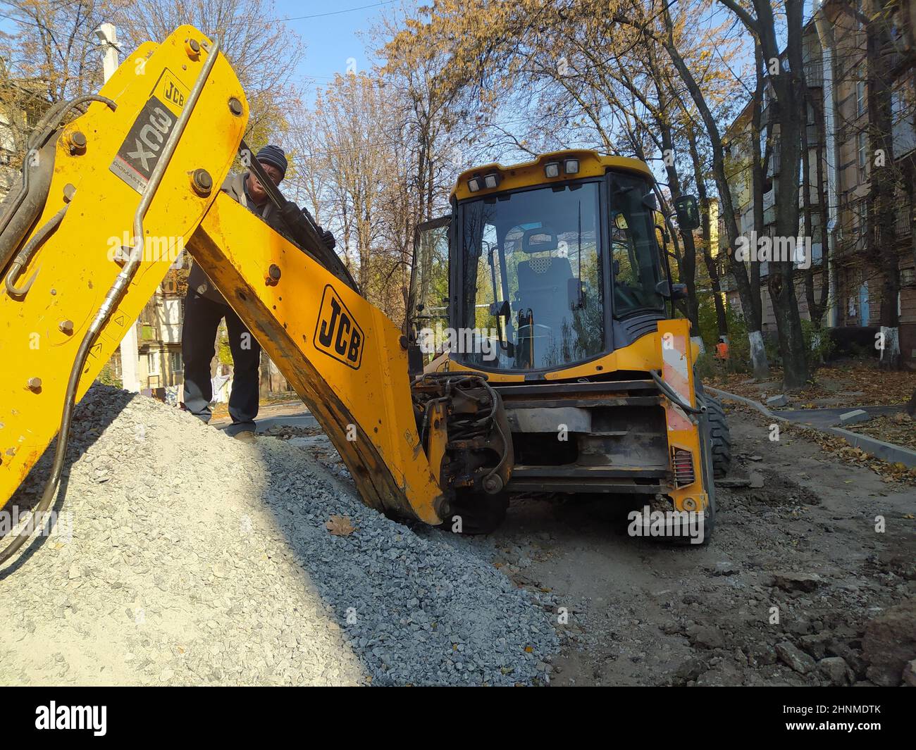 Excavator parked at the construction area Stock Photo - Alamy
