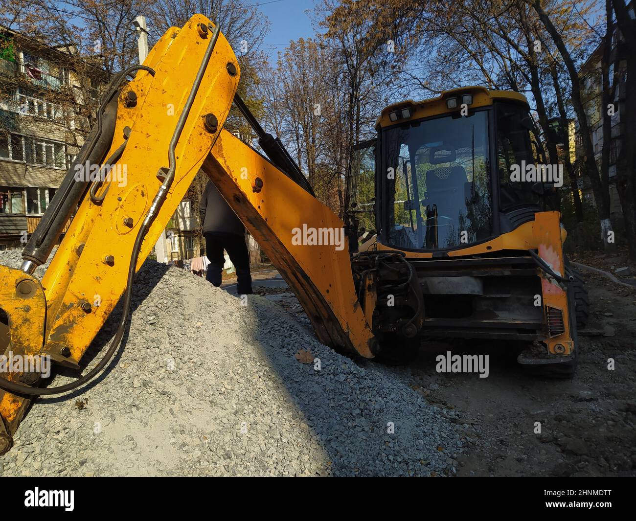 Excavator parked at the construction area Stock Photo - Alamy