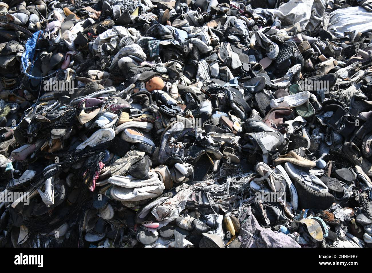 Burnt clothes on a bin in the province of Alicante, Costa Blanca, Spain ...
