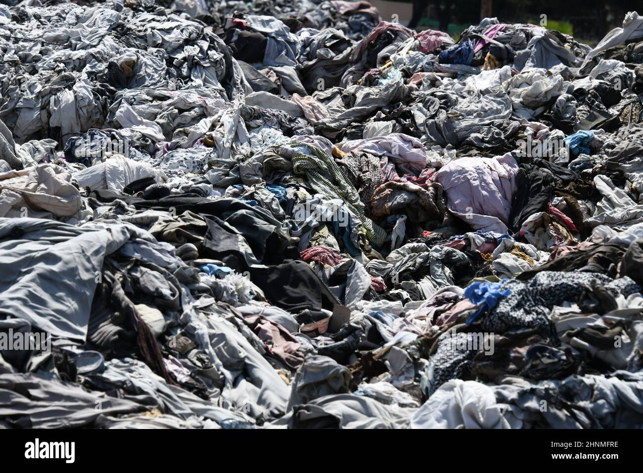 Burnt clothes on a bin in the province of Alicante, Costa Blanca, Spain ...