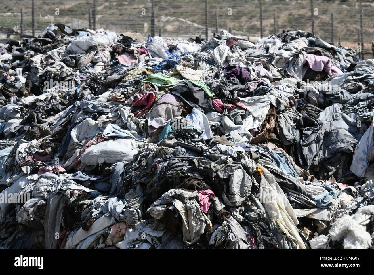 Burnt clothes on a bin in the province of Alicante, Costa Blanca, Spain ...