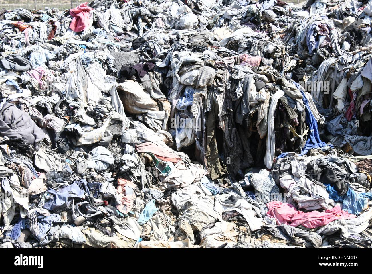Burnt clothes on a bin in the province of Alicante, Costa Blanca, Spain ...