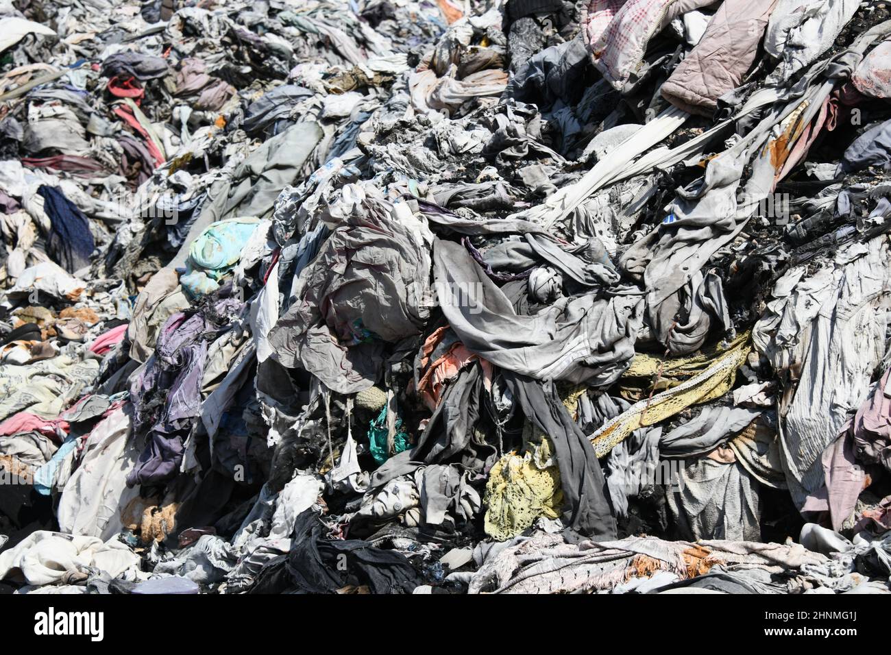 Burnt clothes on a bin in the province of Alicante, Costa Blanca, Spain ...