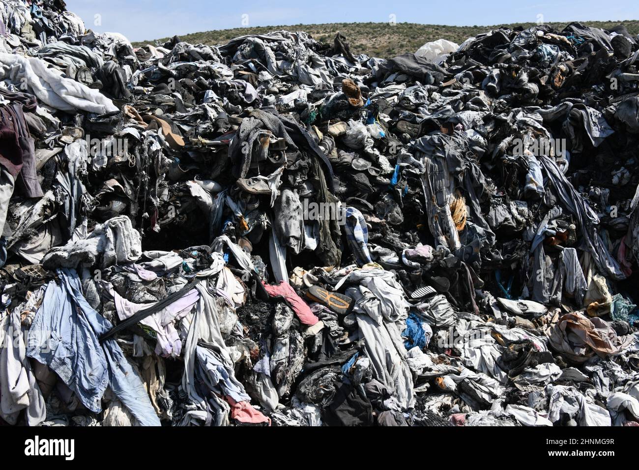 Burnt clothes on a bin in the province of Alicante, Costa Blanca, Spain ...