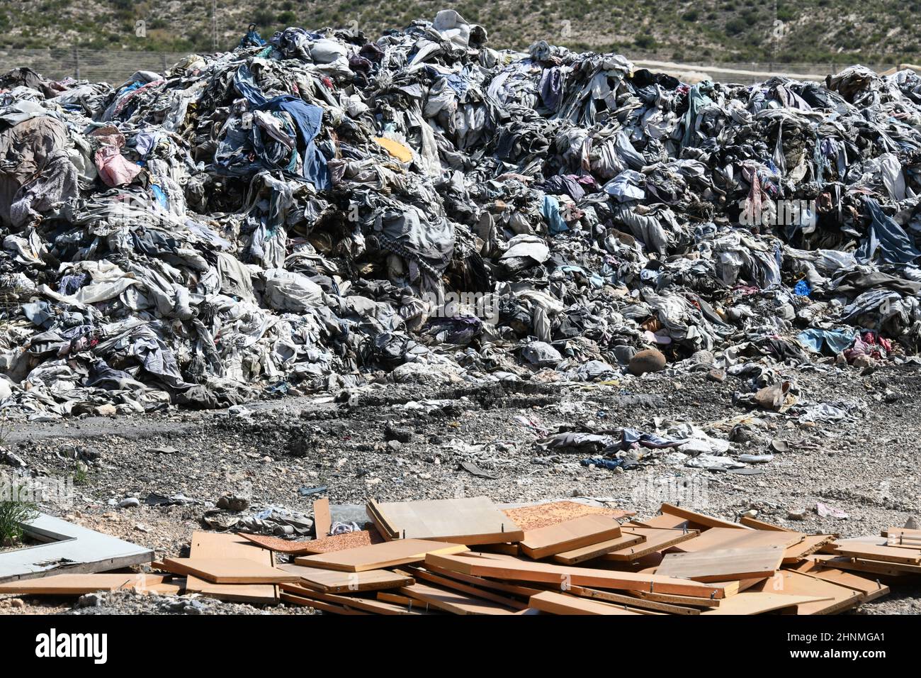 Burnt clothes on a bin in the province of Alicante, Costa Blanca, Spain ...