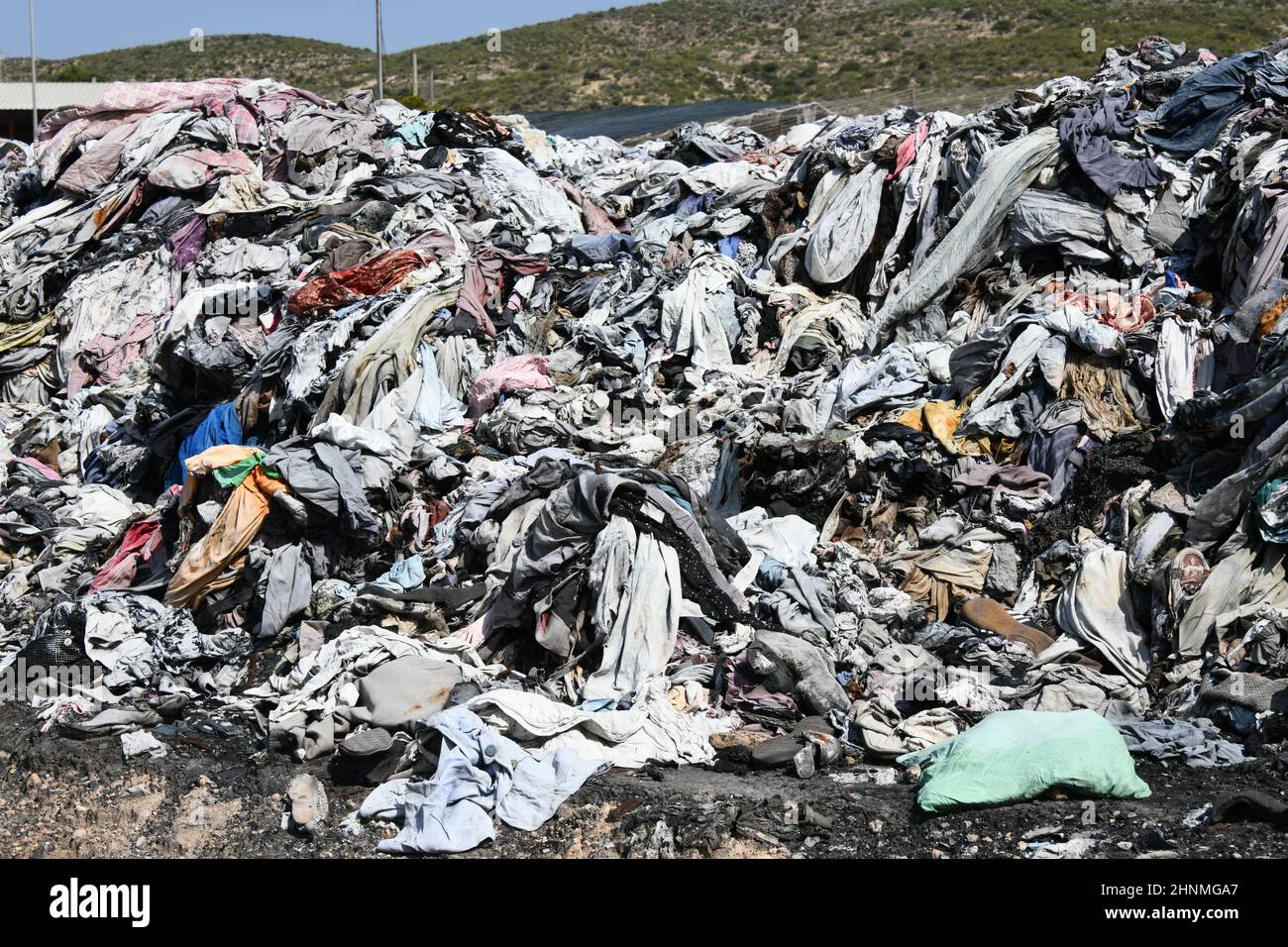 Burnt clothes on a bin in the province of Alicante, Costa Blanca, Spain ...