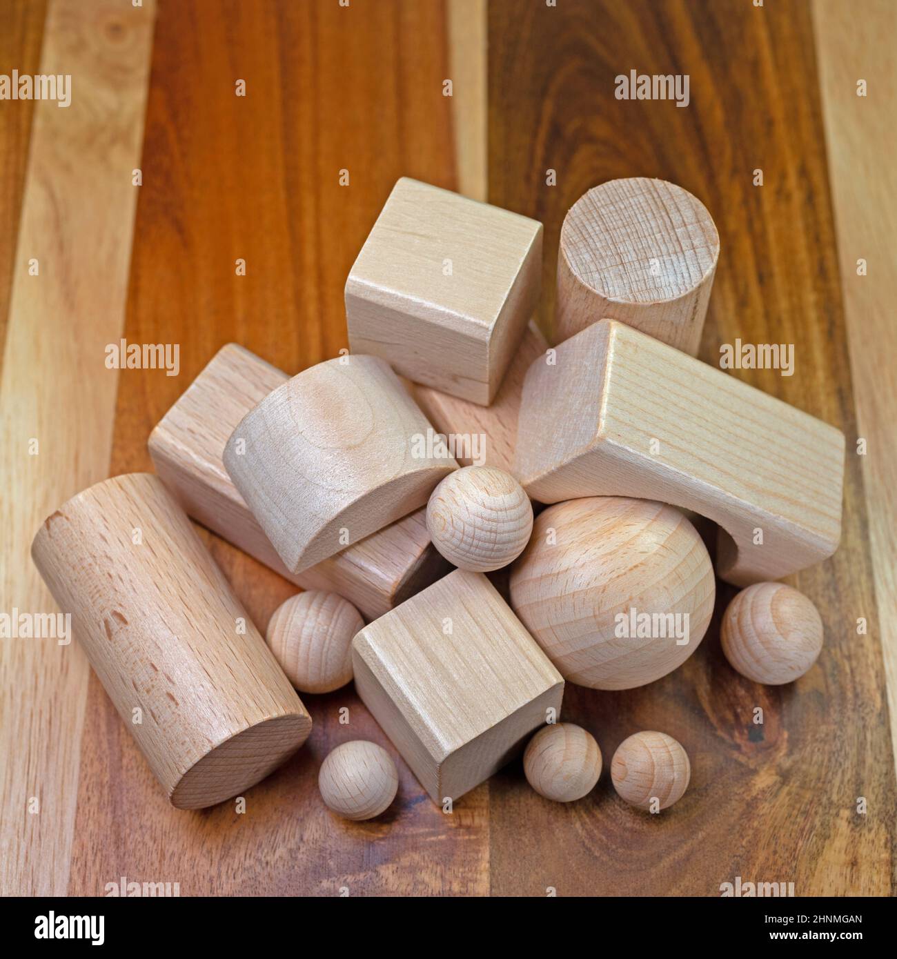 Different wooden blocks and wooden balls Stock Photo - Alamy