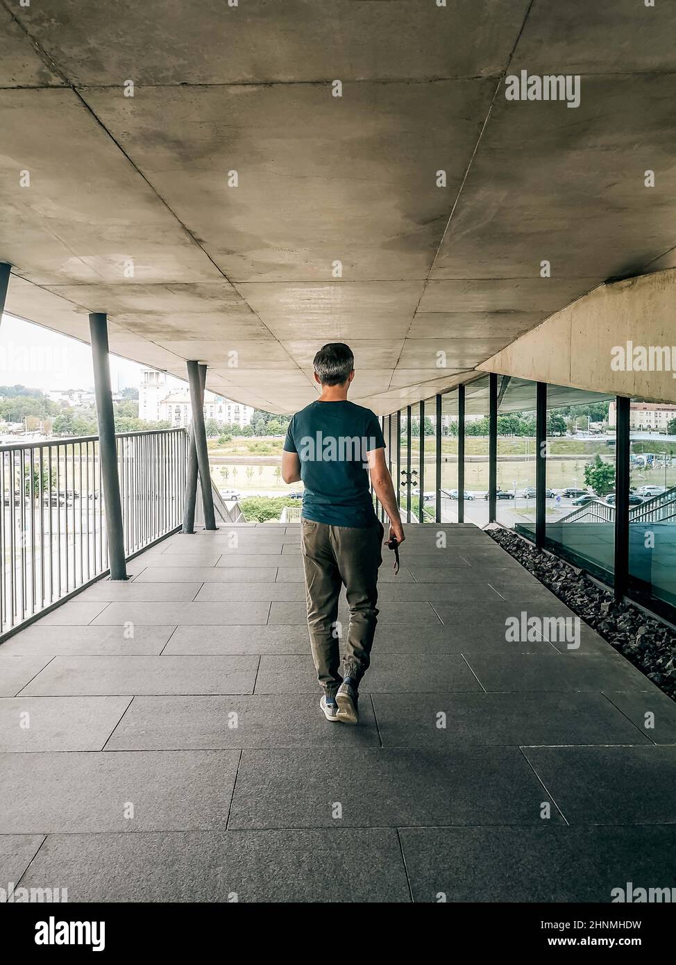 Man from behind walking hi-res stock photography and images - Alamy